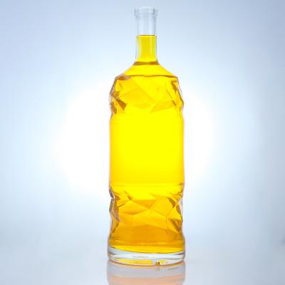 China Liquor Glass Bottle with Embossed Customizable Logo and Clear or Customized Bottle Color for sale
