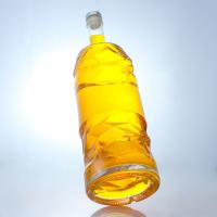 China Liquor Glass Bottle with Embossed Customizable Logo and Clear or Customized Bottle Color for sale