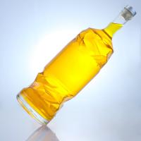 China Liquor Glass Bottle with Embossed Customizable Logo and Clear or Customized Bottle Color for sale