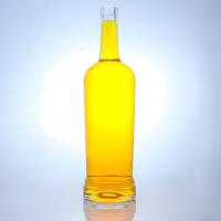 China Glass Base Round Shape Customizable Logo Long Neck Liquor Bottle with Cork for sale