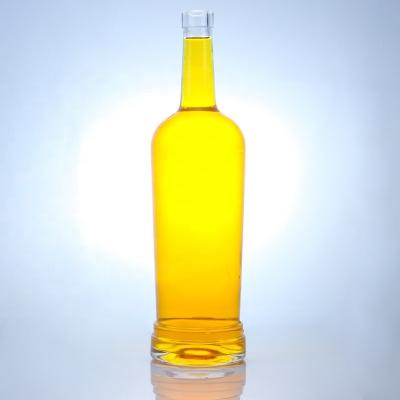 China Glass Base Round Shape Customizable Logo Long Neck Liquor Bottle with Cork for sale