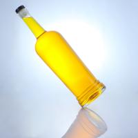 China Glass Base Round Shape Customizable Logo Long Neck Liquor Bottle with Cork for sale