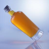 China 750ml Glass Liquor Bottle with Cork Stopper and Custom Cap Body Material Glass for sale