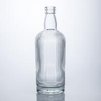 China Heavy Transparent Glass Bottle for Brandy Whisky Gin Custom Shape Cork Top Engraved for sale