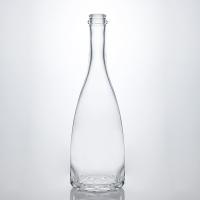 China Embossed Glass Bottle for Gin Rum Vodka Whiskey Sealing Type Cork Flower Shaped Bottom for sale