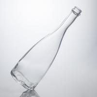 China Embossed Glass Bottle for Gin Rum Vodka Whiskey Sealing Type Cork Flower Shaped Bottom for sale
