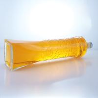 China Industrial Liquor Glass Bottle with Unique Shape and Embossed Super Flint Material for sale