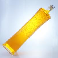 China Industrial Liquor Glass Bottle with Unique Shape and Embossed Super Flint Material for sale