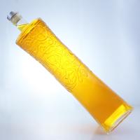 China Industrial Liquor Glass Bottle with Unique Shape and Embossed Super Flint Material for sale
