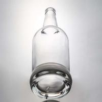 China Customized Logo Glass Collar 700ml Round Liquor Bottle for Vodka Brandy Whisky and More for sale