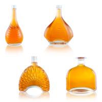China Custom Logo Glass Bottle for Brandy Gin Rum Whisky Unique Design and Super Flint for sale