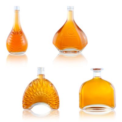China Custom Logo Glass Bottle for Brandy Gin Rum Whisky Unique Design and Super Flint for sale