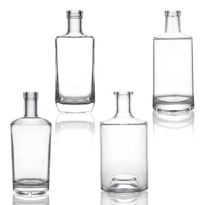 China Super flint glass Customized logo 750ml 700ml popular style rum vodka whisky tequila gin glass bottle with cork for sale