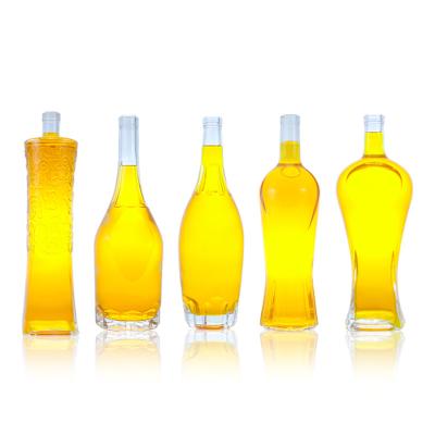 China Custom Cap 500ml 700ml 750ml Unique Shape Glass Bottle for Rum Vodka Whisky Tequila Gin for sale