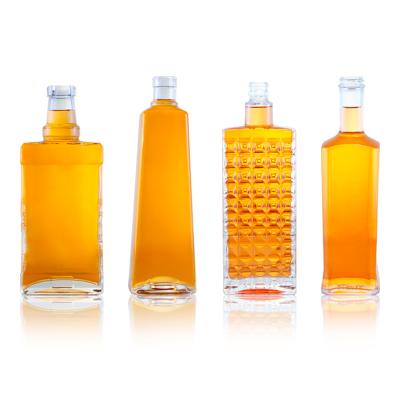 China Rum Vodka Whisky Tequila Gin Glass Bottle with Lid Made of Super Flint Material for sale
