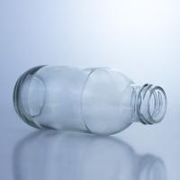 China 300ml Round Glass Milk Bottle with Lid Liquor Storage Solution Decal Surface Handling for sale