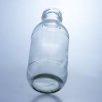 China 300ml Round Glass Milk Bottle with Lid Liquor Storage Solution Decal Surface Handling for sale