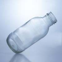 China 300ml Round Glass Milk Bottle with Lid Liquor Storage Solution Decal Surface Handling for sale