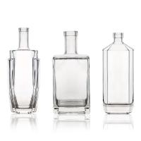 China Custom Cap Glass Liquor Bottle with Customized Logo for Vodka Whisky Rum Gin Tequila for sale