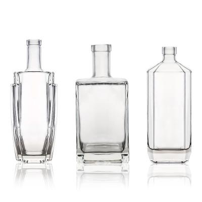 China Custom Cap Glass Liquor Bottle with Customized Logo for Vodka Whisky Rum Gin Tequila for sale