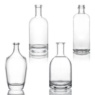 China Glass Material Customizable Capacity and Shape Rum Vodka Whisky Tequila Gin Bottle with Lid for sale
