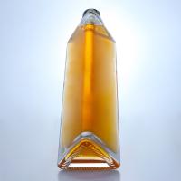 China Custom Cap Super Flint Glass 750ml Triangle Liquor Bottle for Vodka Whisky Gin Rum for sale