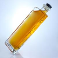 China Custom Cap Super Flint Glass 750ml Triangle Liquor Bottle for Vodka Whisky Gin Rum for sale