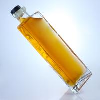 China Custom Cap Super Flint Glass 750ml Triangle Liquor Bottle for Vodka Whisky Gin Rum for sale
