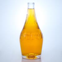 China Industrial Liquor Glass Bottle with Custom Embossed Body and Cork Stopper for sale