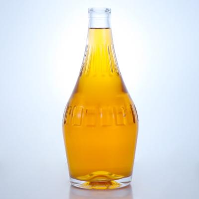 China Industrial Liquor Glass Bottle with Custom Embossed Body and Cork Stopper for sale