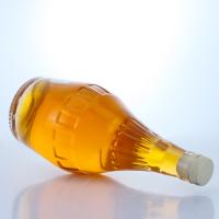 China Industrial Liquor Glass Bottle with Custom Embossed Body and Cork Stopper for sale