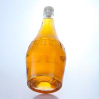 China Industrial Liquor Glass Bottle with Custom Embossed Body and Cork Stopper for sale