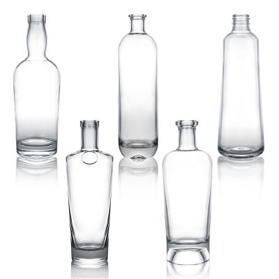 China Super Flint Glass 700ml 750ml Rum Vodka Whisky Tequila Gin Glass Bottle with Lid for sale