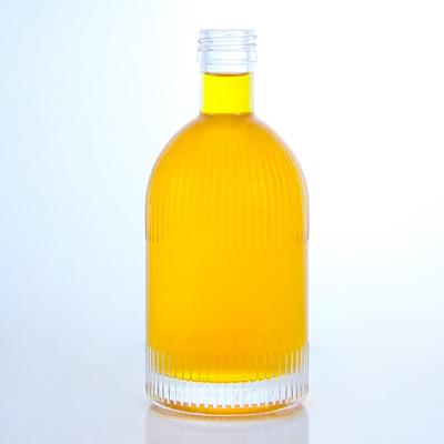 China Industrial Liquor Glass Bottle with Screw Cap Stripes and Customized Logo for sale