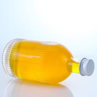 China Industrial Liquor Glass Bottle with Screw Cap Stripes and Customized Logo for sale