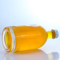 China Industrial Liquor Glass Bottle with Screw Cap Stripes and Customized Logo for sale