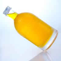 China Industrial Liquor Glass Bottle with Screw Cap Stripes and Customized Logo for sale