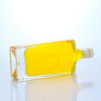 China Industrial Liquor square glass bottle with guala cap and customizable capacity for sale