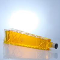 China Clear Unique Shaped 700ml 75cl Embossed Super Flint Rum Vodka Whisky Glass Bottle With Screw Cap for sale