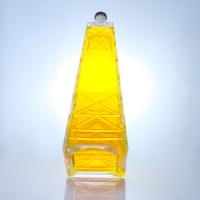 China Clear Unique Shaped 700ml 75cl Embossed Super Flint Rum Vodka Whisky Glass Bottle With Screw Cap for sale
