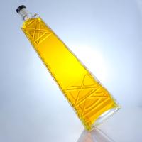 China Clear Unique Shaped 700ml 75cl Embossed Super Flint Rum Vodka Whisky Glass Bottle With Screw Cap for sale
