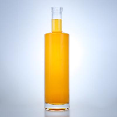 China 700ml Cylindrical Glass Bottle for Brandy Whisky Gin Rum Champagne Clear Flint for sale