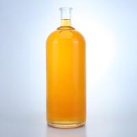 China Tequila Vodka Rum Whisky Liquor Glass Bottle with Cork 1000ml High Flint Cylinder Shape for sale