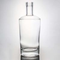 China Collar Material Glass 750ml Round Shaped Clear Flint Bottle for Customized Gin Rum for sale