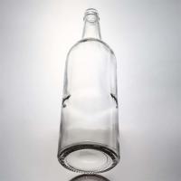China Surface Handling Decal Glass Bottle 1000ml Round Shaped Perfect for Gin Rum Champagne Liquor for sale