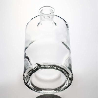China Clear or Customized Round Shaped 750ml 1000ml Glass Bottle With Wood Cork for Whisky for sale