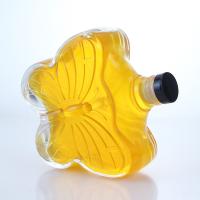 China Beverage 330ml Clear Super Flint Empty Glass Bottles with Customized Logo for sale