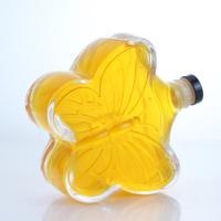 China Beverage 330ml Clear Super Flint Empty Glass Bottles with Customized Logo for sale