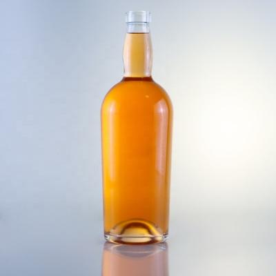 China Unique Design 700ml 750ml Brandy Vodka Tequila Glass Bottle With Cork Customized Logo for sale