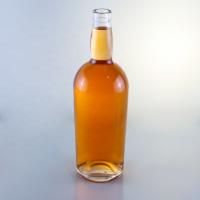 China Unique Design 700ml 750ml Brandy Vodka Tequila Glass Bottle With Cork Customized Logo for sale